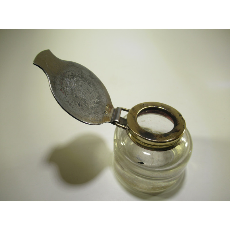 Old round glass inkwell